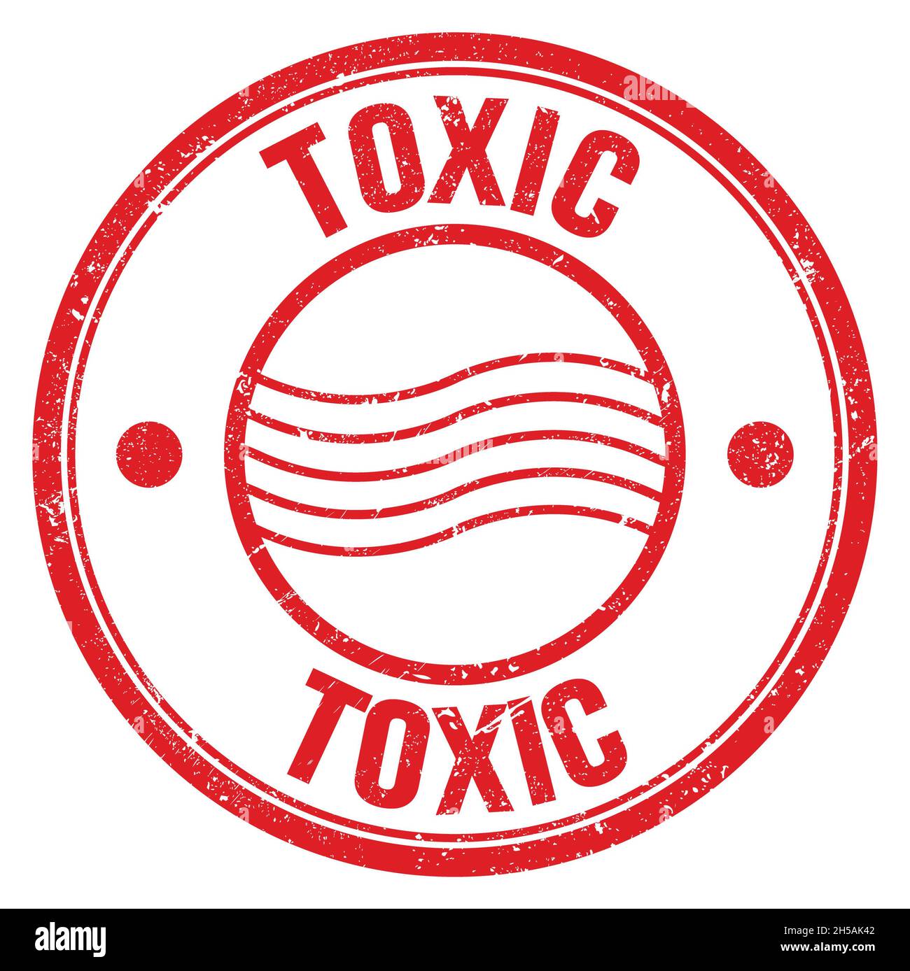 TOXIC word written on red round postal stamp sign Stock Photo - Alamy