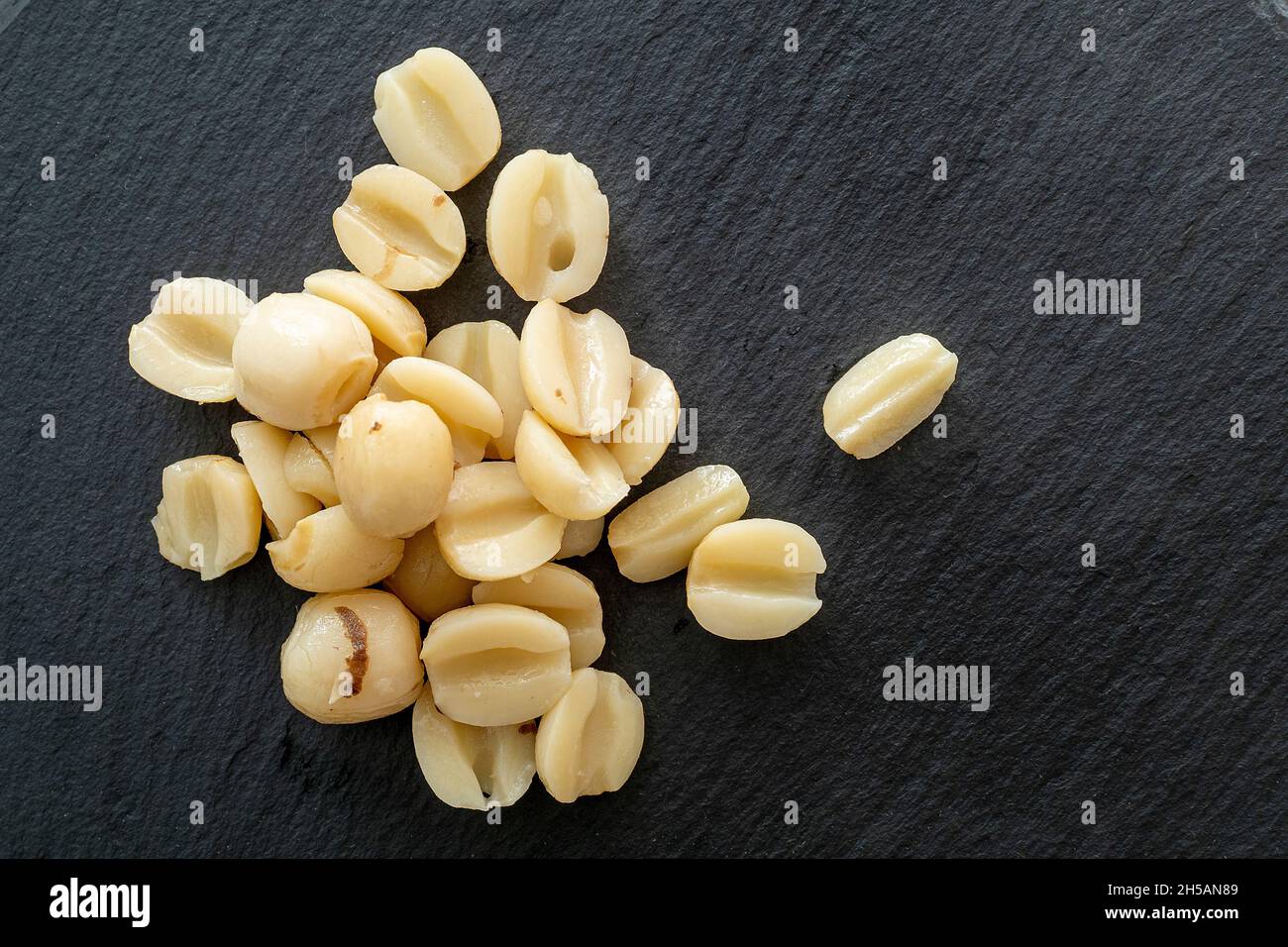 Sweet Lotus seeds on slate. Canned Lotus beans as the traditional asian ...
