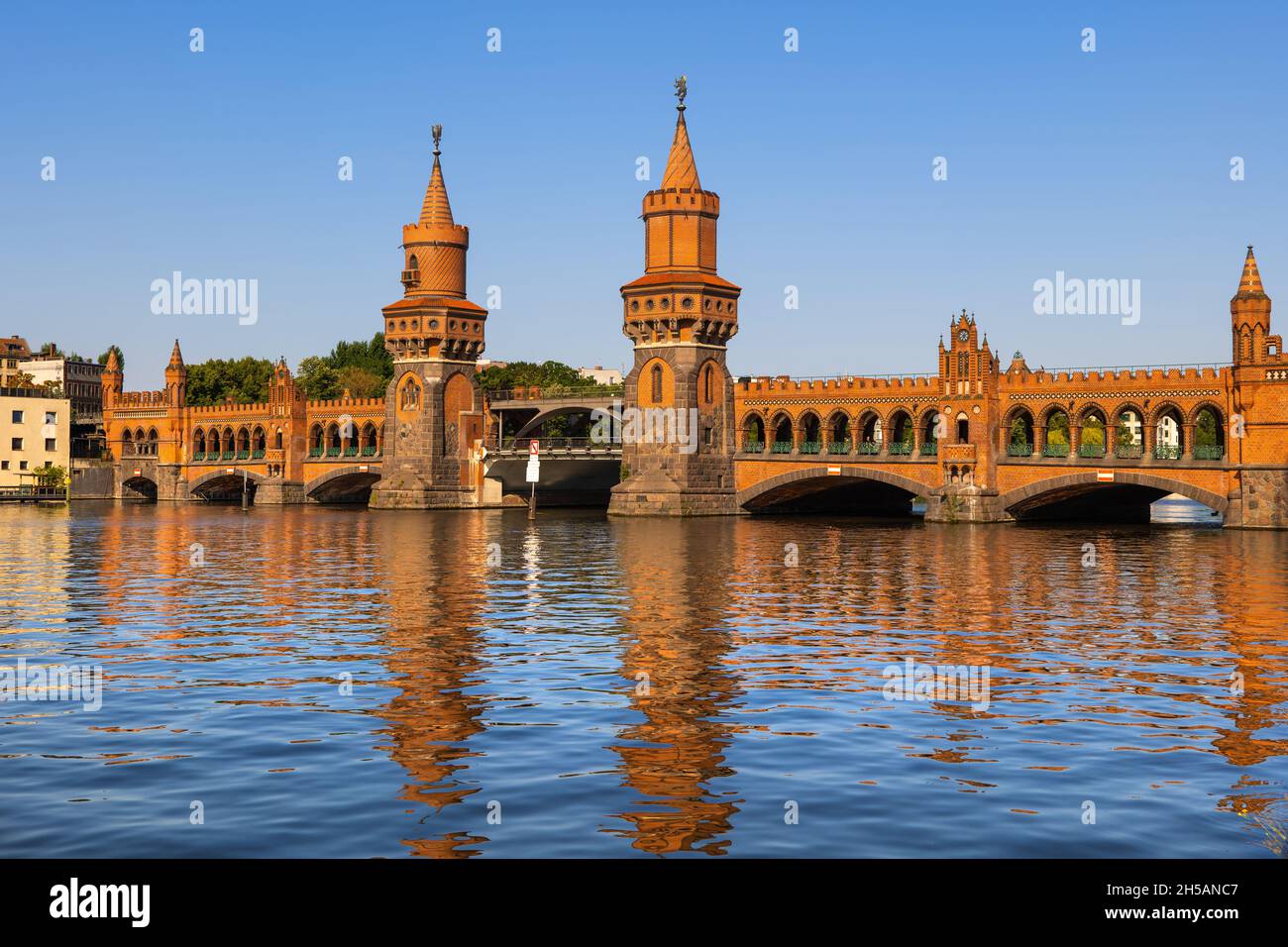 Oberbaum Bridge (Oberbaumbrucke) on River Spree at sunset in city of ...