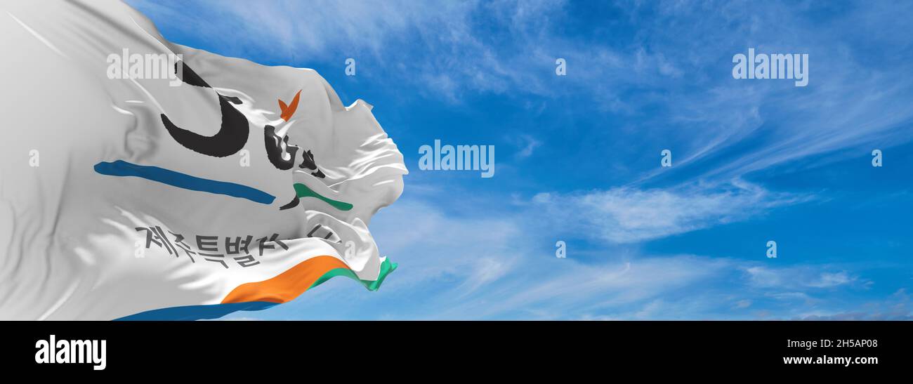 flag of Jeju , South Korea at cloudy sky background on sunset ...