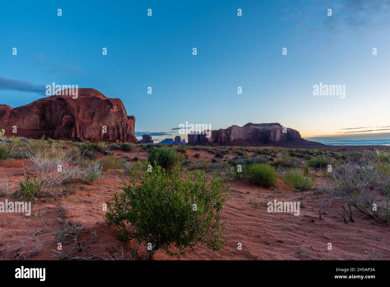 Tranquil southwest scene with large stone formations in Monument Valley ...