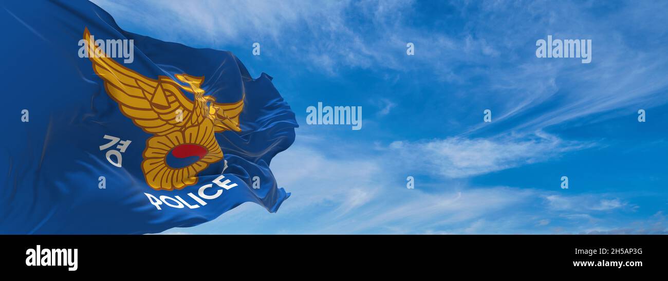 flag of Korean National Police Agency , South Korea at cloudy sky ...