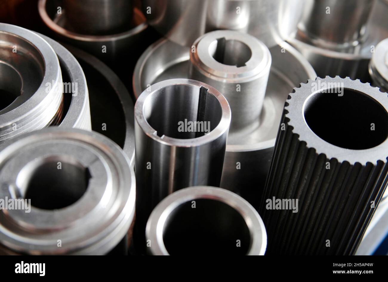 New rollers and gear wheel Stock Photo - Alamy