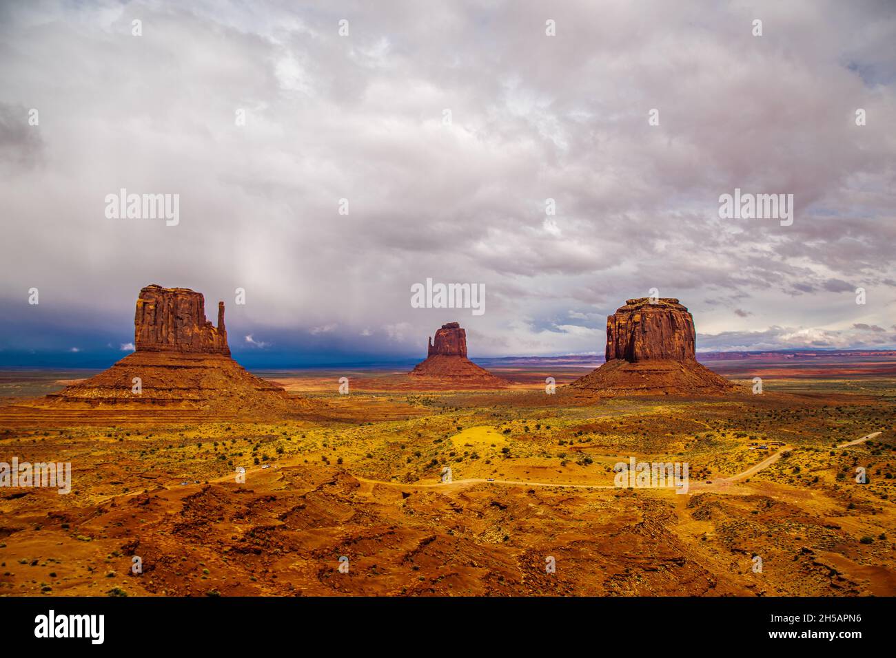 Scenic East and West Mitten Buttes at Monument Valley Stock Photo - Alamy