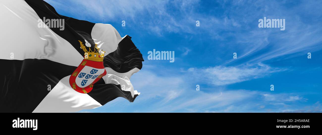 flag of Ceuta , Spain at cloudy sky background on sunset, panoramic ...