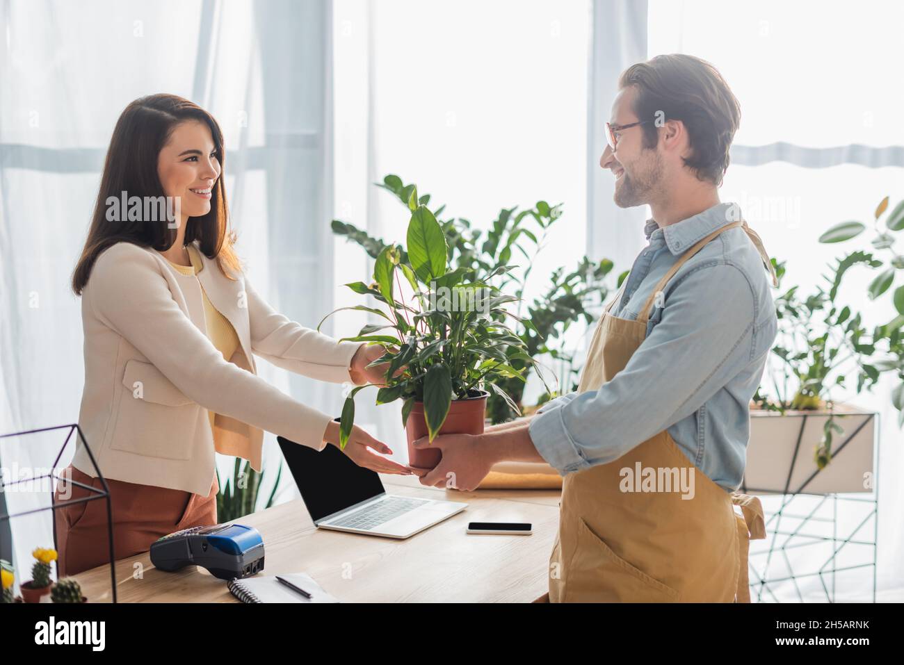 Giving plants hi-res stock photography and images - Alamy
