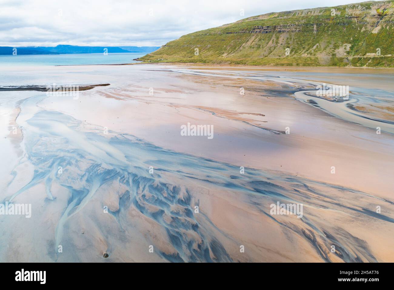 Aerial view of sandbanks in the fjord Kaldalon with mountains ...