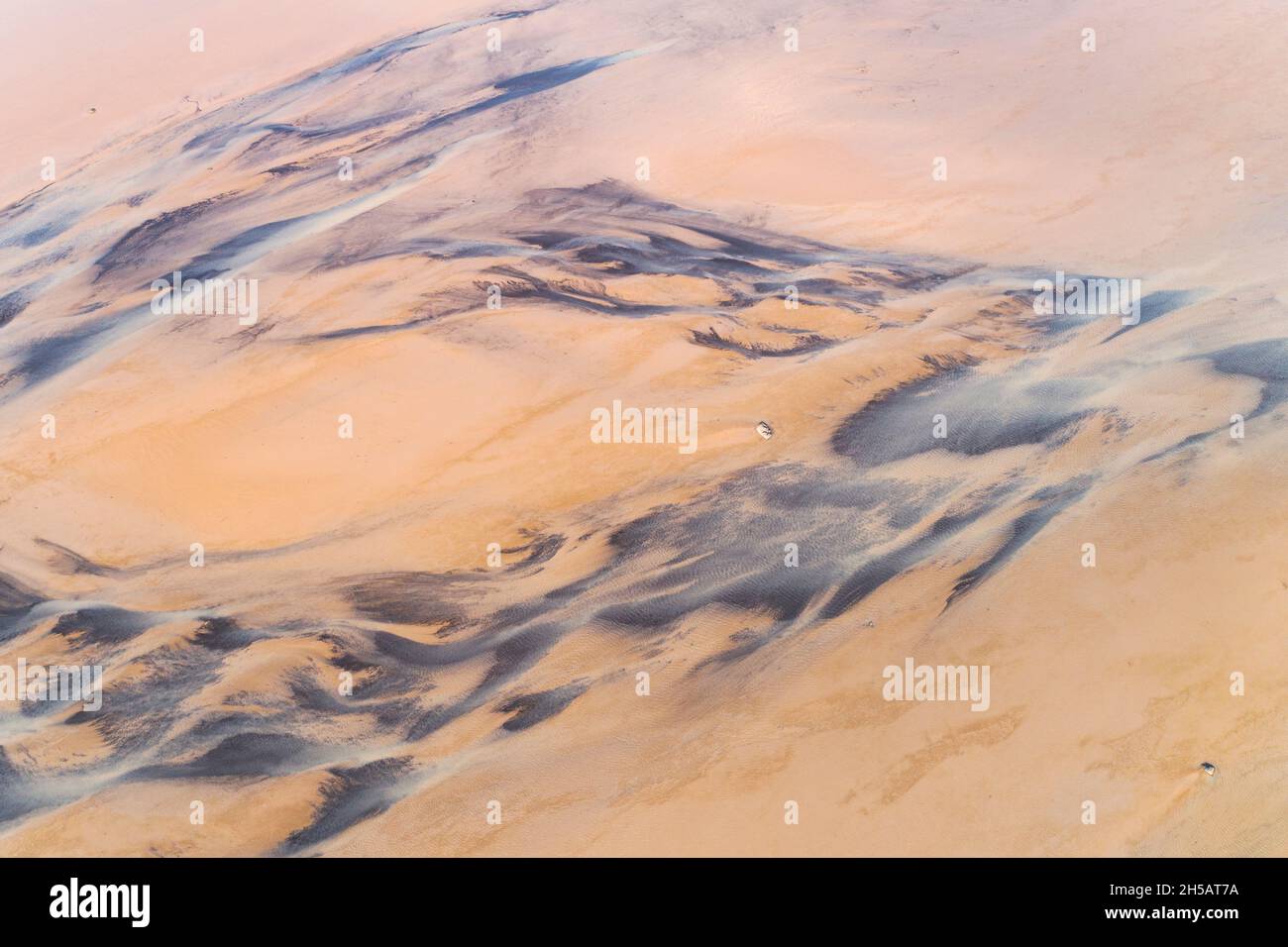 Aerial view of sandbanks in the fjord Kaldalon, where water from the ...