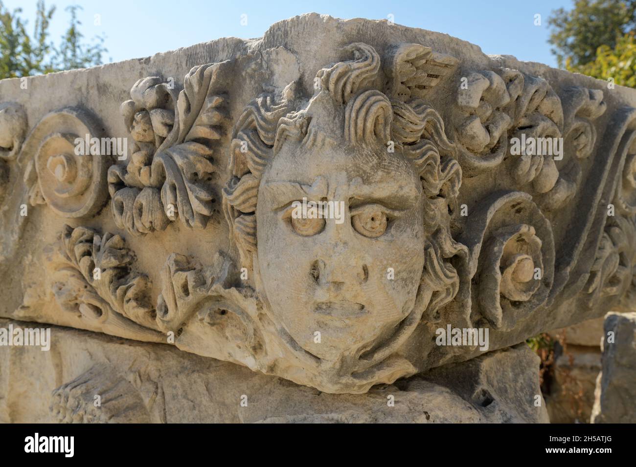 Stone faces and masks of ancient theater in Myra. Demre, Antalya ...