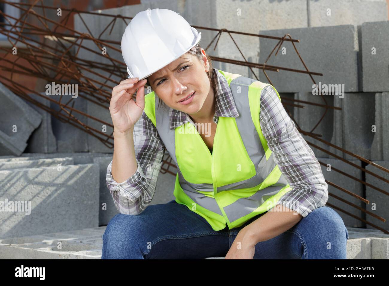 Female construction headache hi-res stock photography and images - Alamy