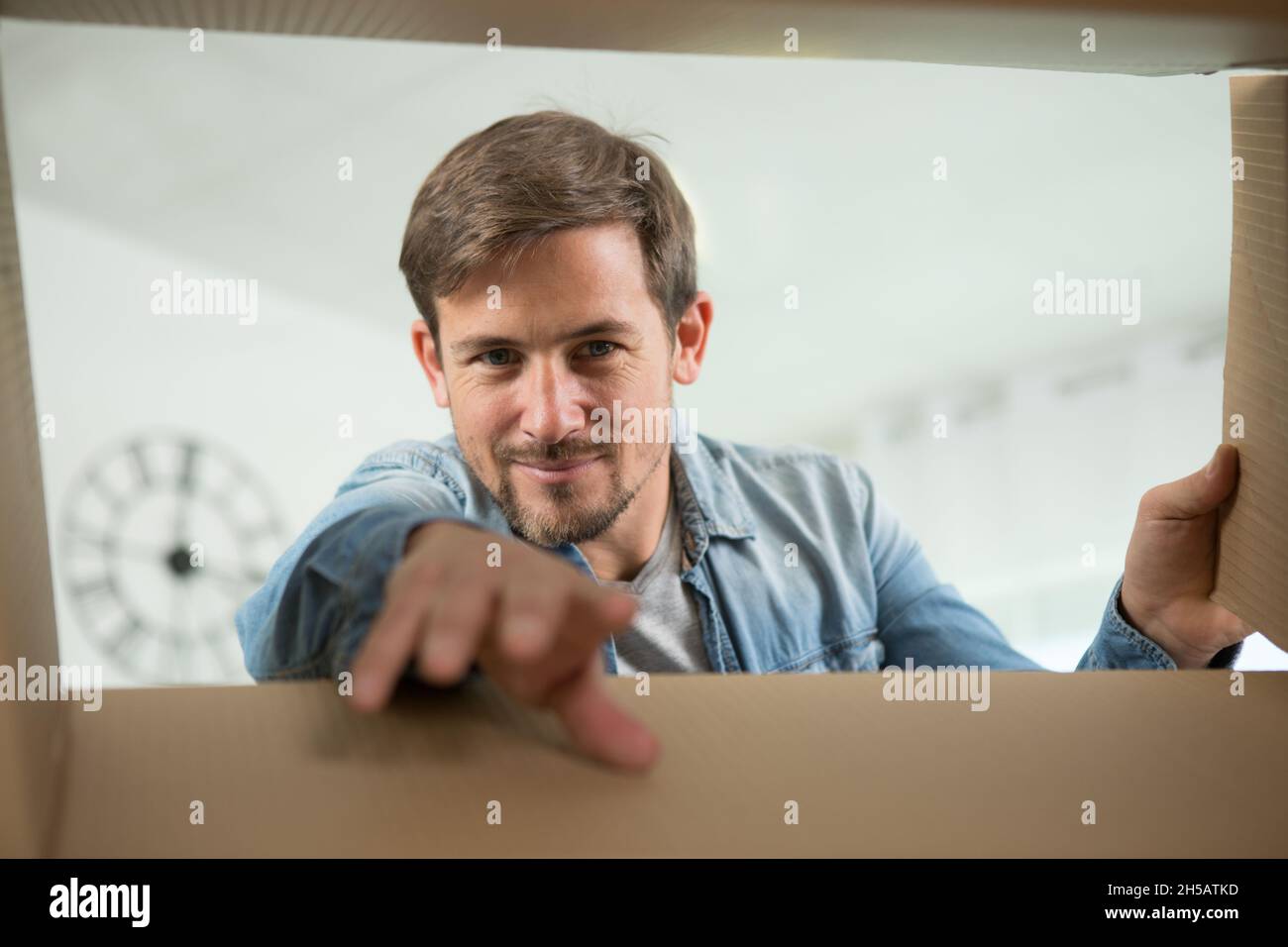 Man inside a crate hi-res stock photography and images - Alamy