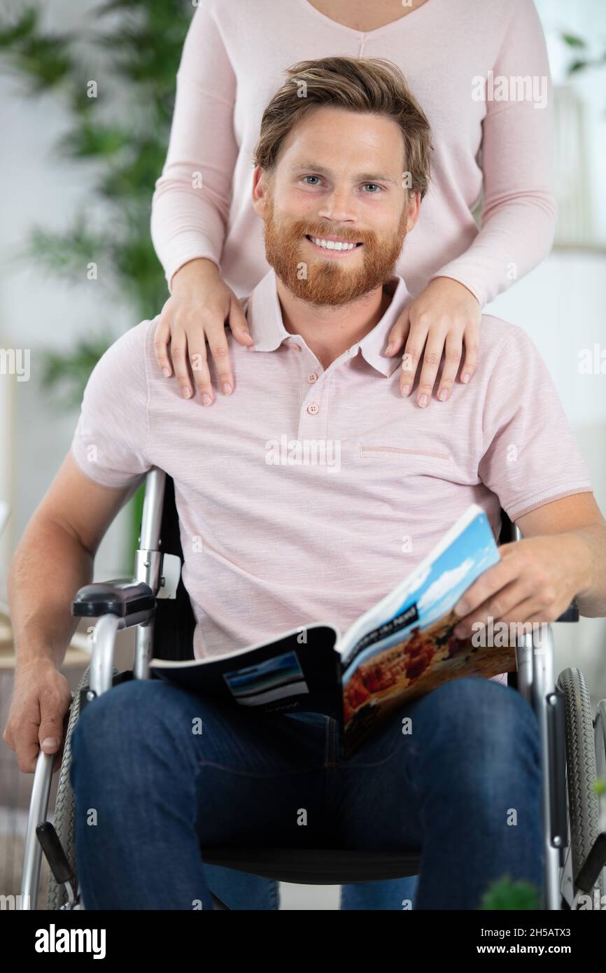 positive handicapped man at home Stock Photo - Alamy