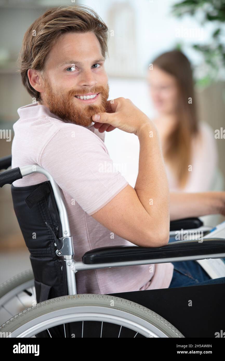 Man disabled woman sitting sofa hi-res stock photography and images - Alamy