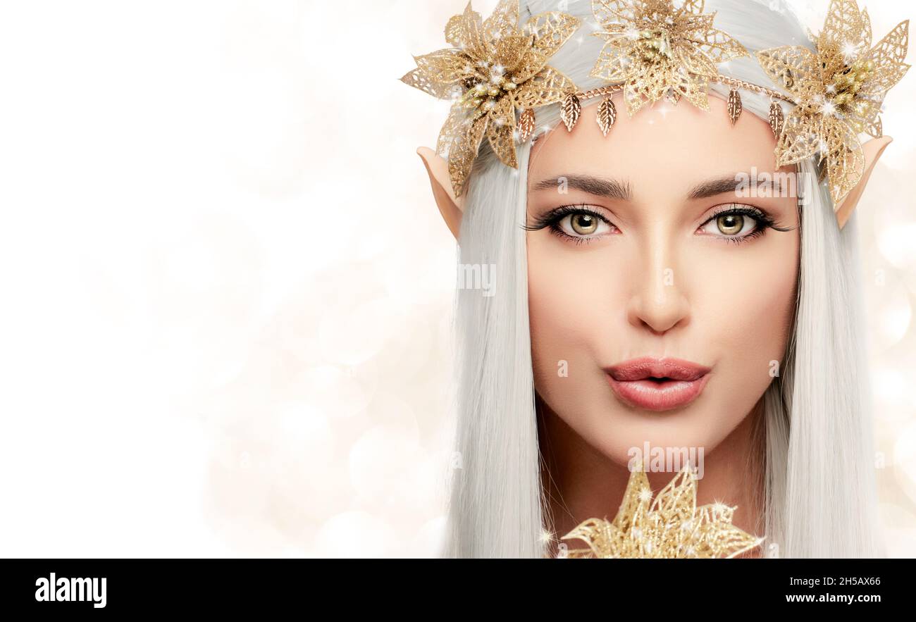 Gorgeous young woman with straight silver hair dressed as an Elf Queen ...