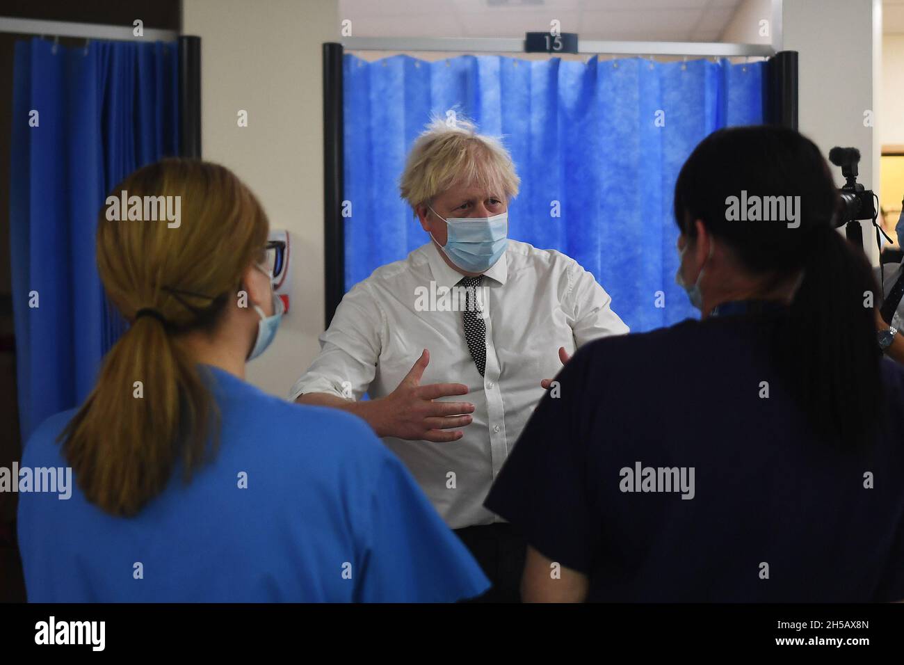 Prime Minister Boris Johnson meets with medical staff during a visit to ...