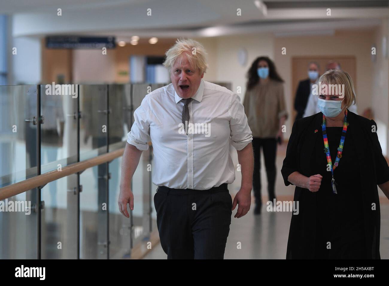 Prime Minister Boris Johnson with Marion Dickson, Executive Director of ...