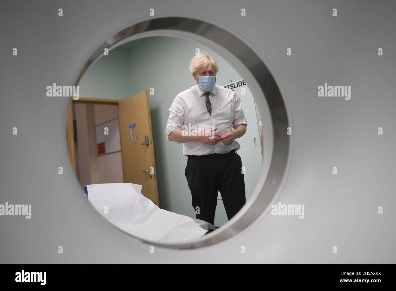 Prime Minister Boris Johnson is shown around a CT scan room during a ...