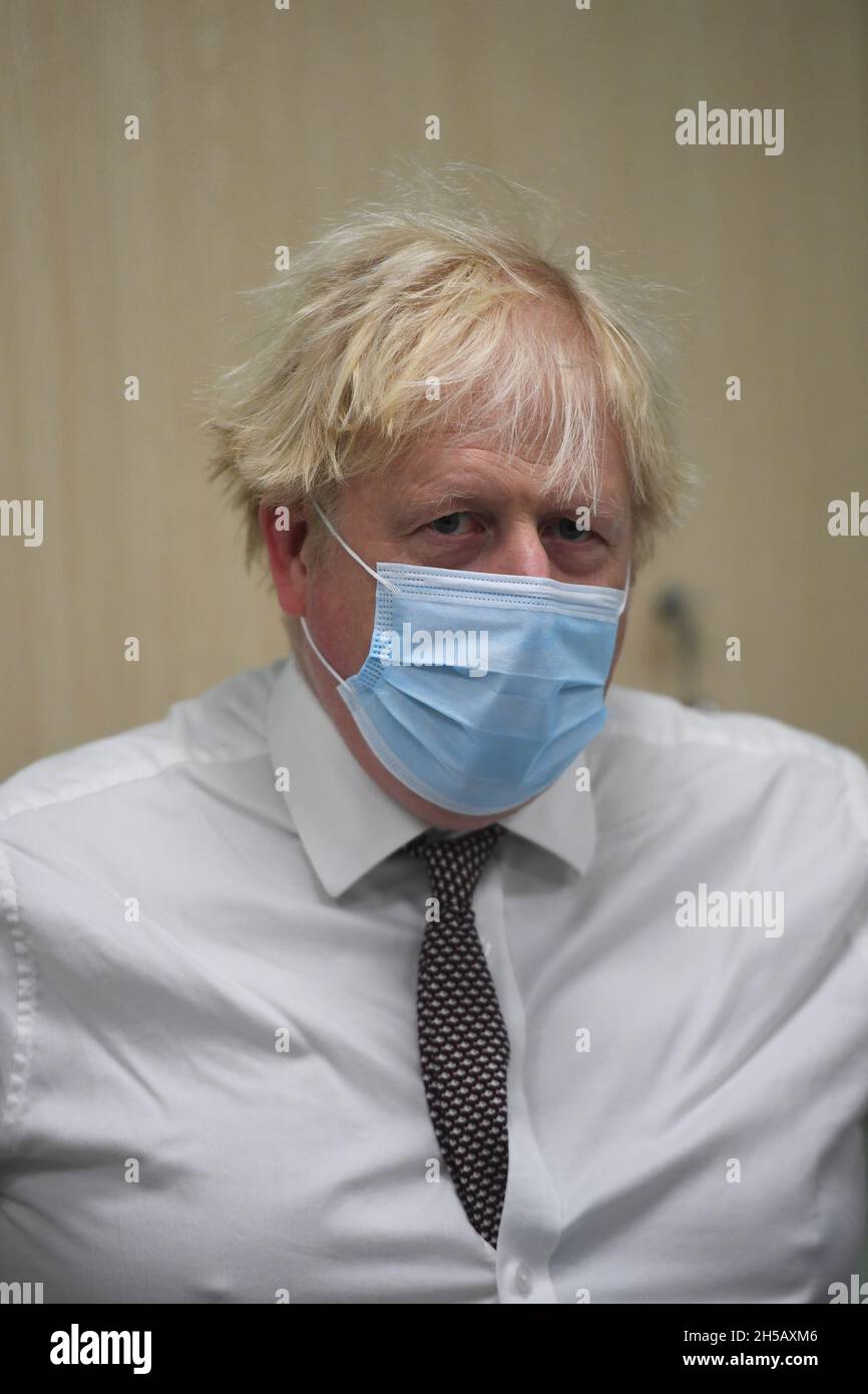 Prime Minister Boris Johnson is shown around a CT scan room during a ...