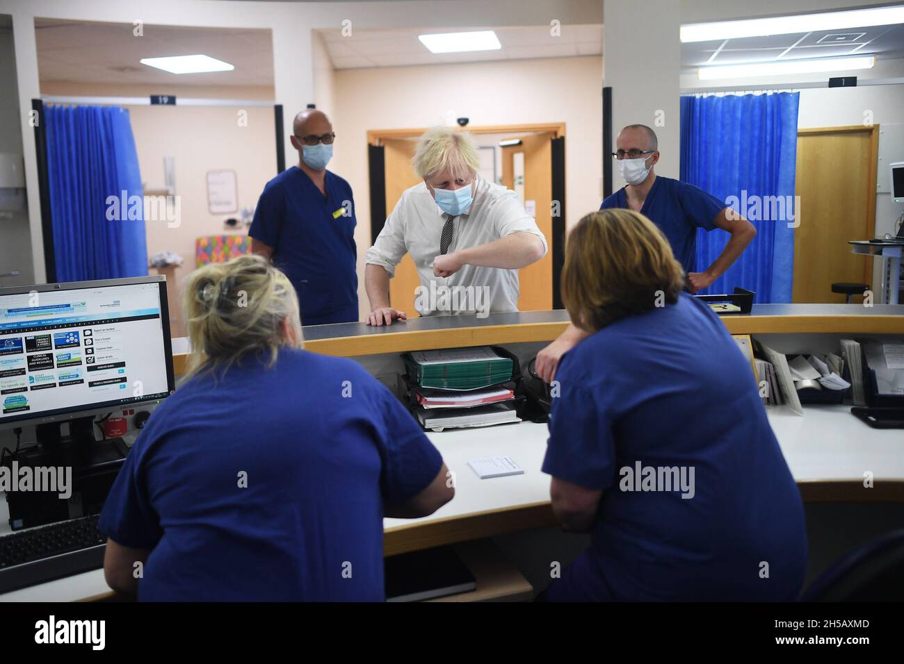 Prime Minister Boris Johnson meets with medical staff during a visit to ...