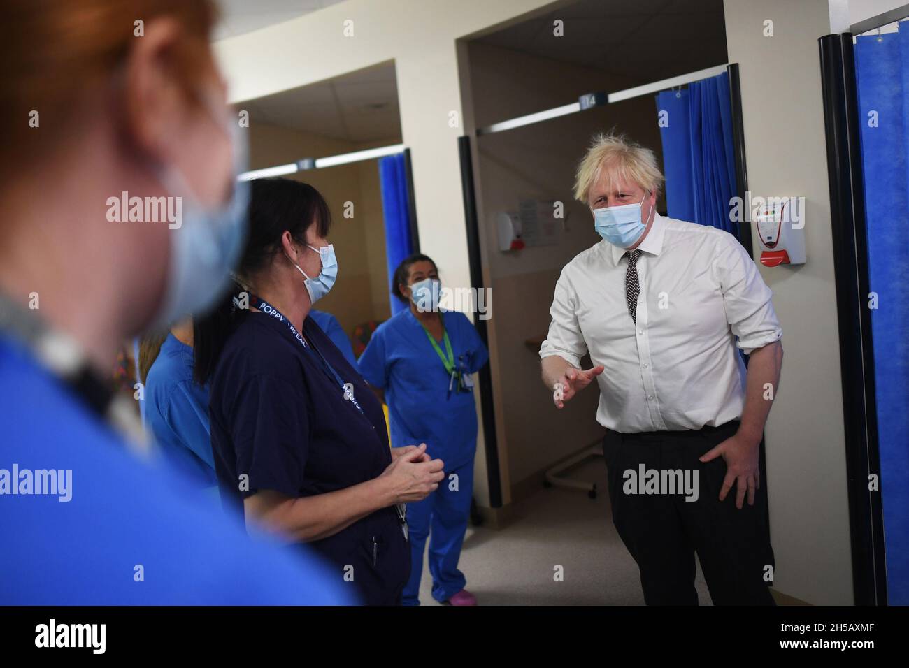 Prime Minister Boris Johnson meets with medical staff during a visit to ...