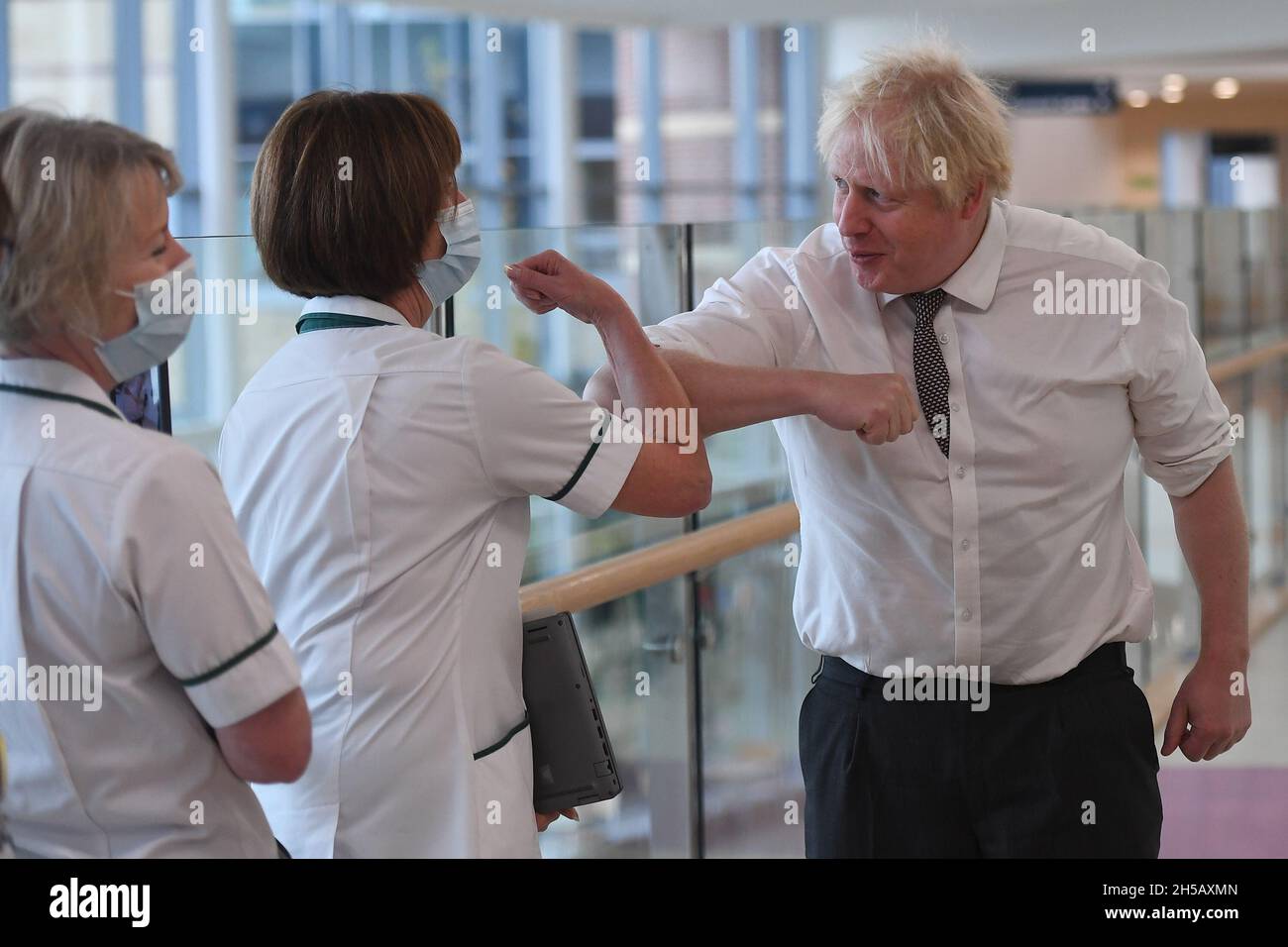 Prime Minister Boris Johnson meets with medical staff during a visit to ...