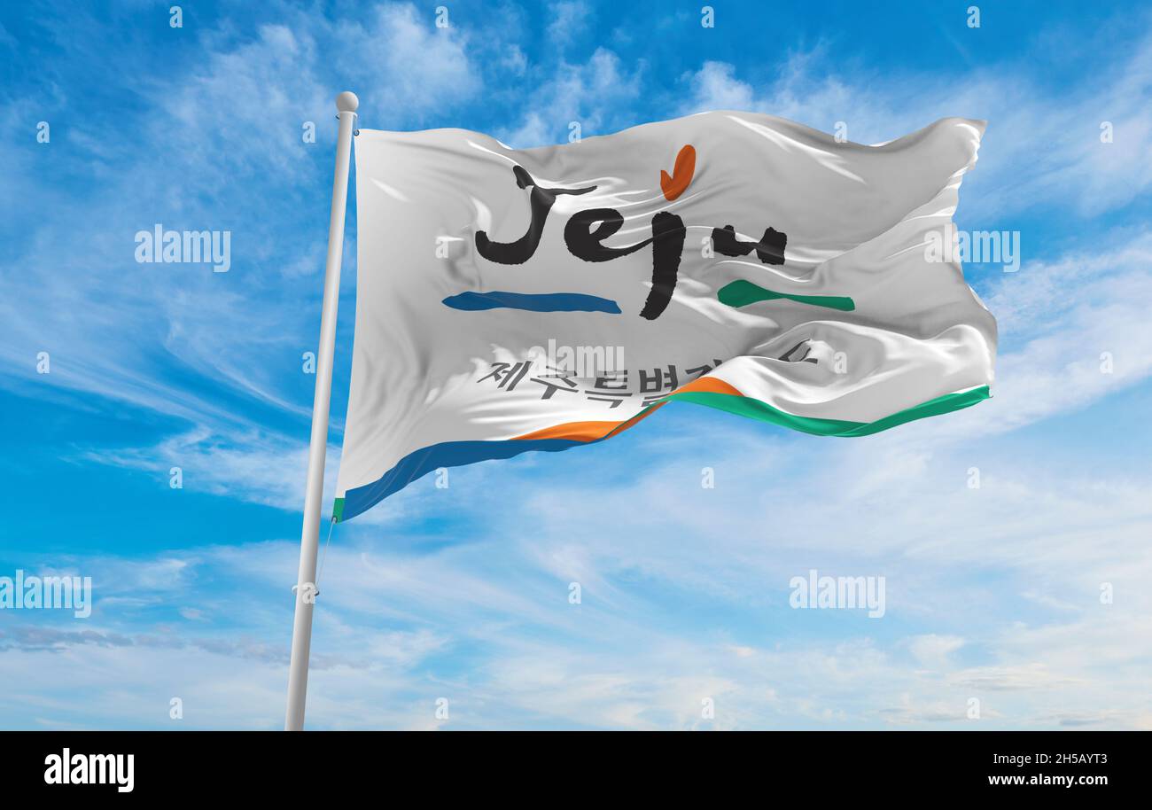 flag of Jeju , South Korea at cloudy sky background on sunset ...