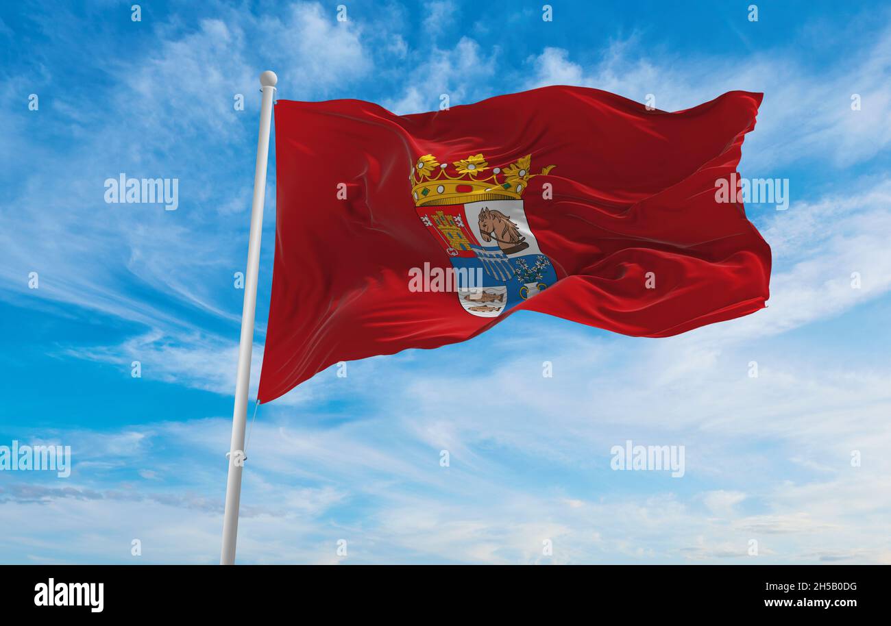 flag of Segovia province , Spain at cloudy sky background on sunset ...