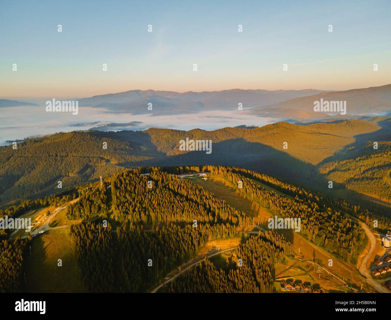 aerial view of sunrise above mountain range copy space Stock Photo - Alamy