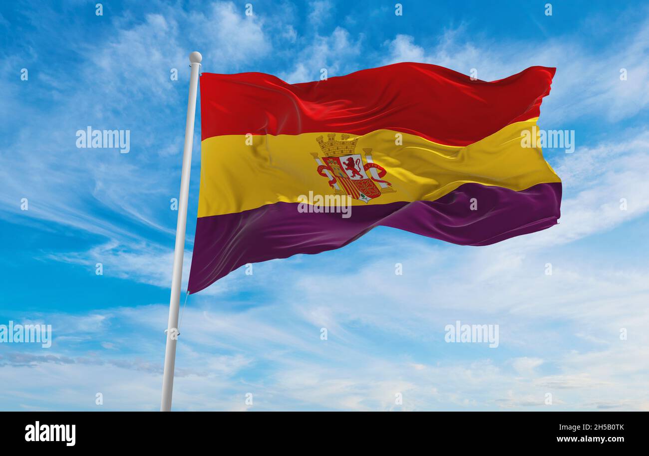flag of Spain 1931-1939 , Spain at cloudy sky background on sunset ...