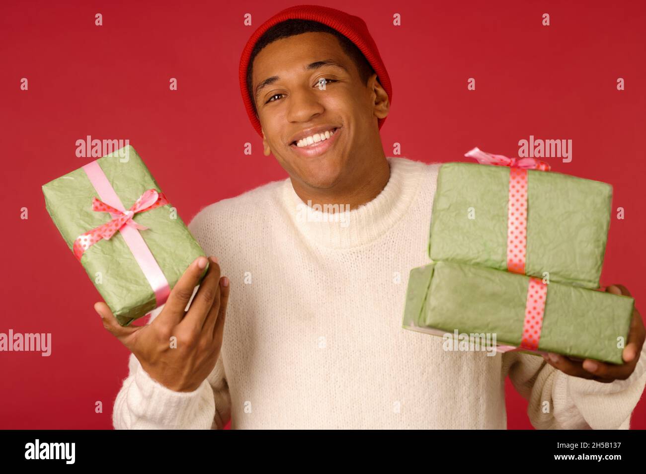 Young guy in red hat hi-res stock photography and images - Alamy
