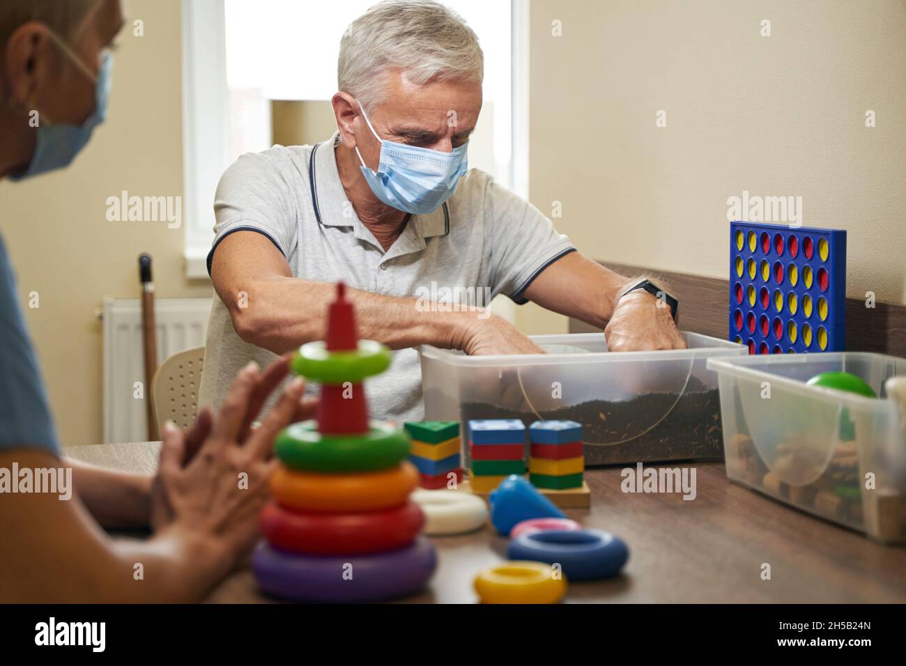 Stroke patient at occupational therapy in rehab center Stock Photo - Alamy