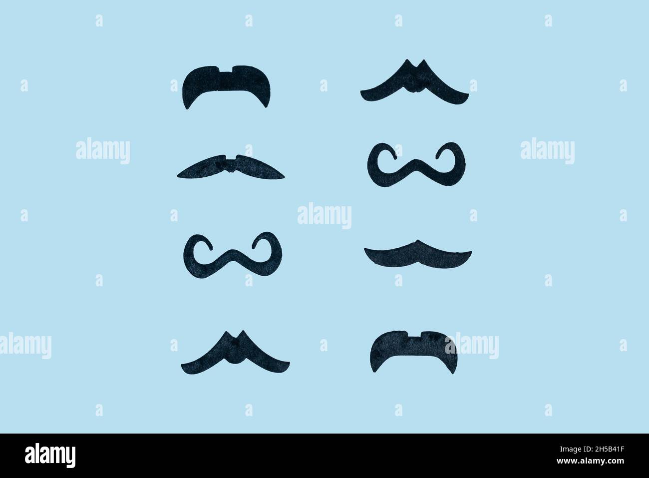 Set of stylish funny fake mustaches on light blue background Stock ...