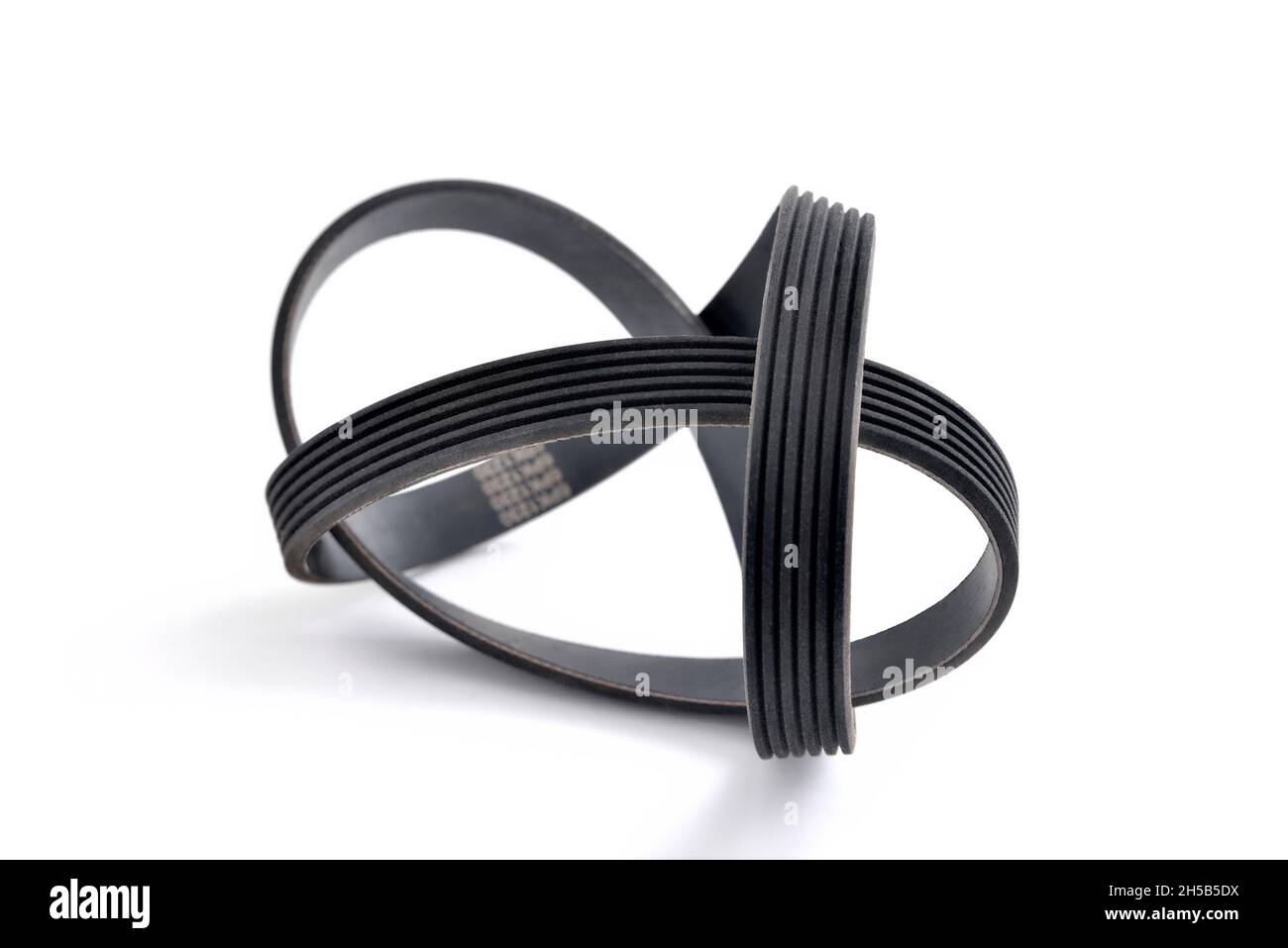 A new belt for a poly-V-ribbed electric generator. Car timing belt ...
