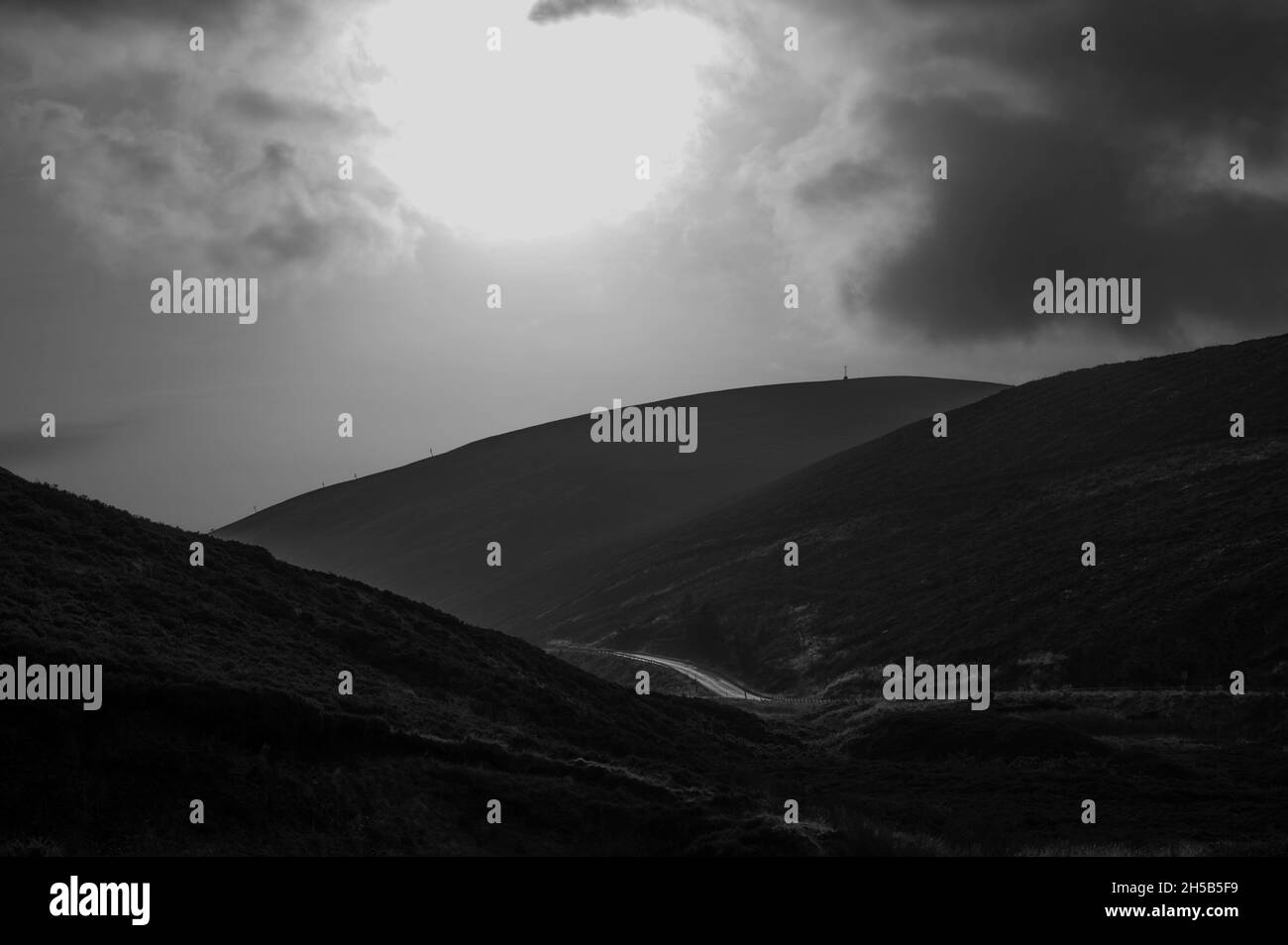 Dramatic black and white image of the mountains and road at Lecht in ...