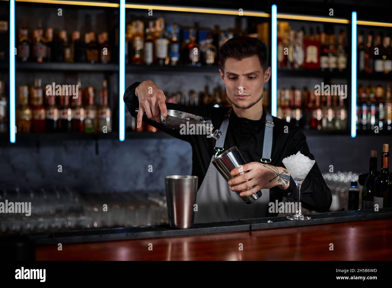 Barman pours transparent drink cocktail hi-res stock photography and ...