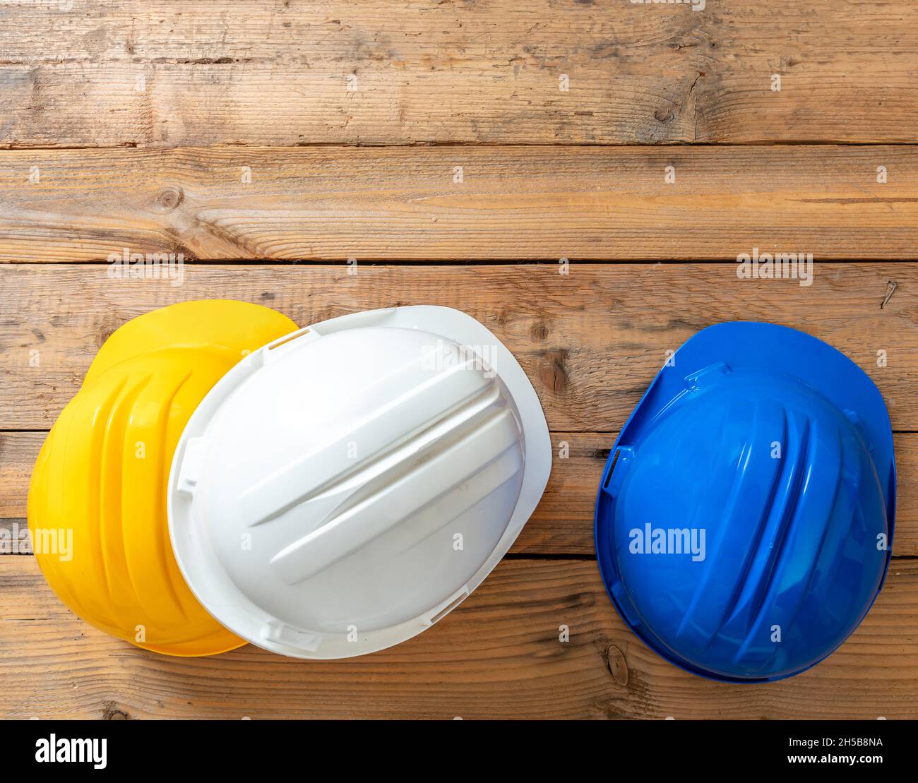 Safety helmets helmet hat hats hi-res stock photography and images - Alamy
