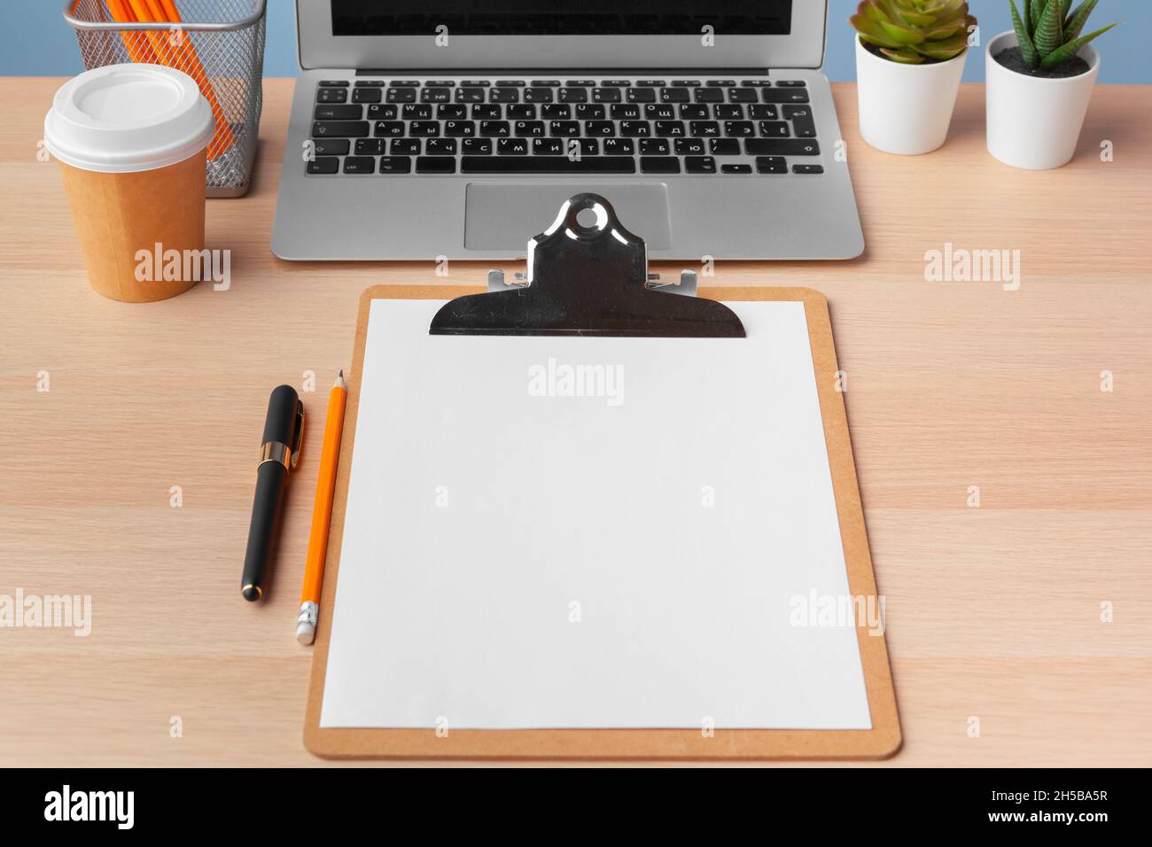 paperwork in the office and laptop on the desktop Stock Photo - Alamy