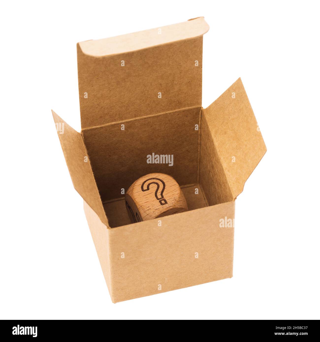 Wooden cube with a question mark in a cardboard box isolated on a white ...