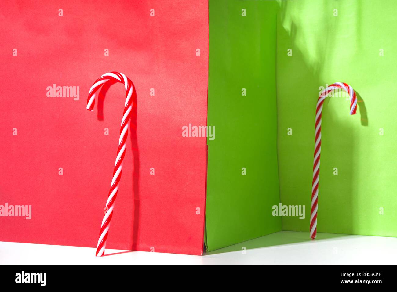 Simple graphic modern Christmas mockup design with hard shadows. Candy ...