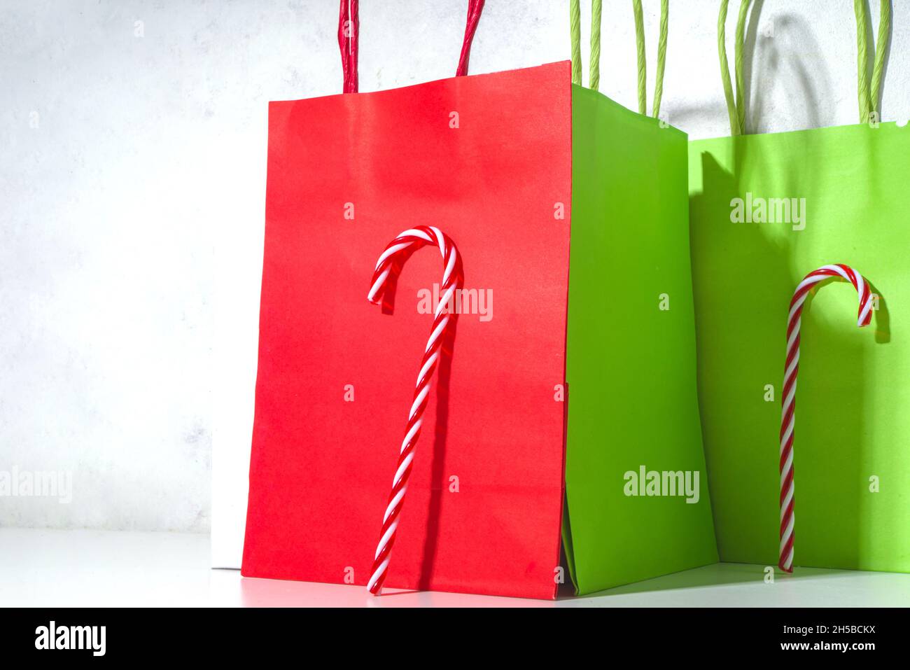 Simple graphic modern Christmas mockup design with hard shadows. Candy ...
