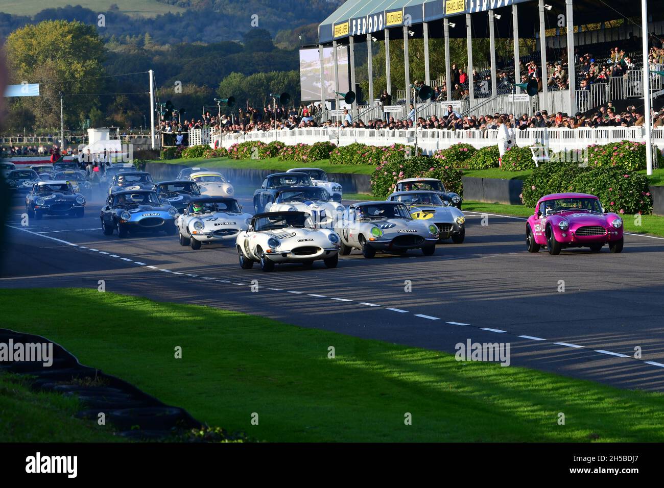 A tyre smoking start to the race, Moss Trophy, Closed cockpit ...