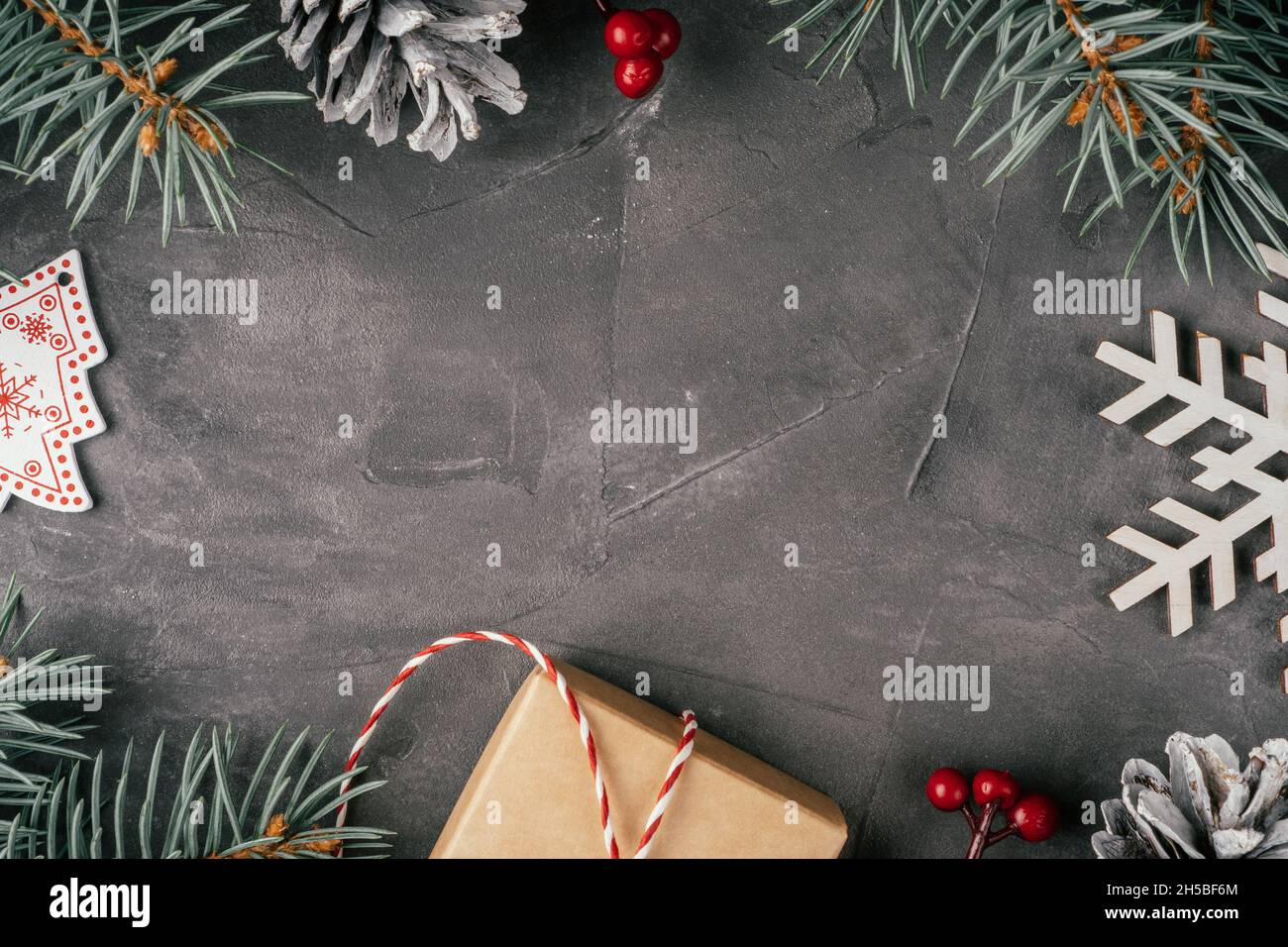 Background image. Frame of Christmas decorations on gray uneven ...