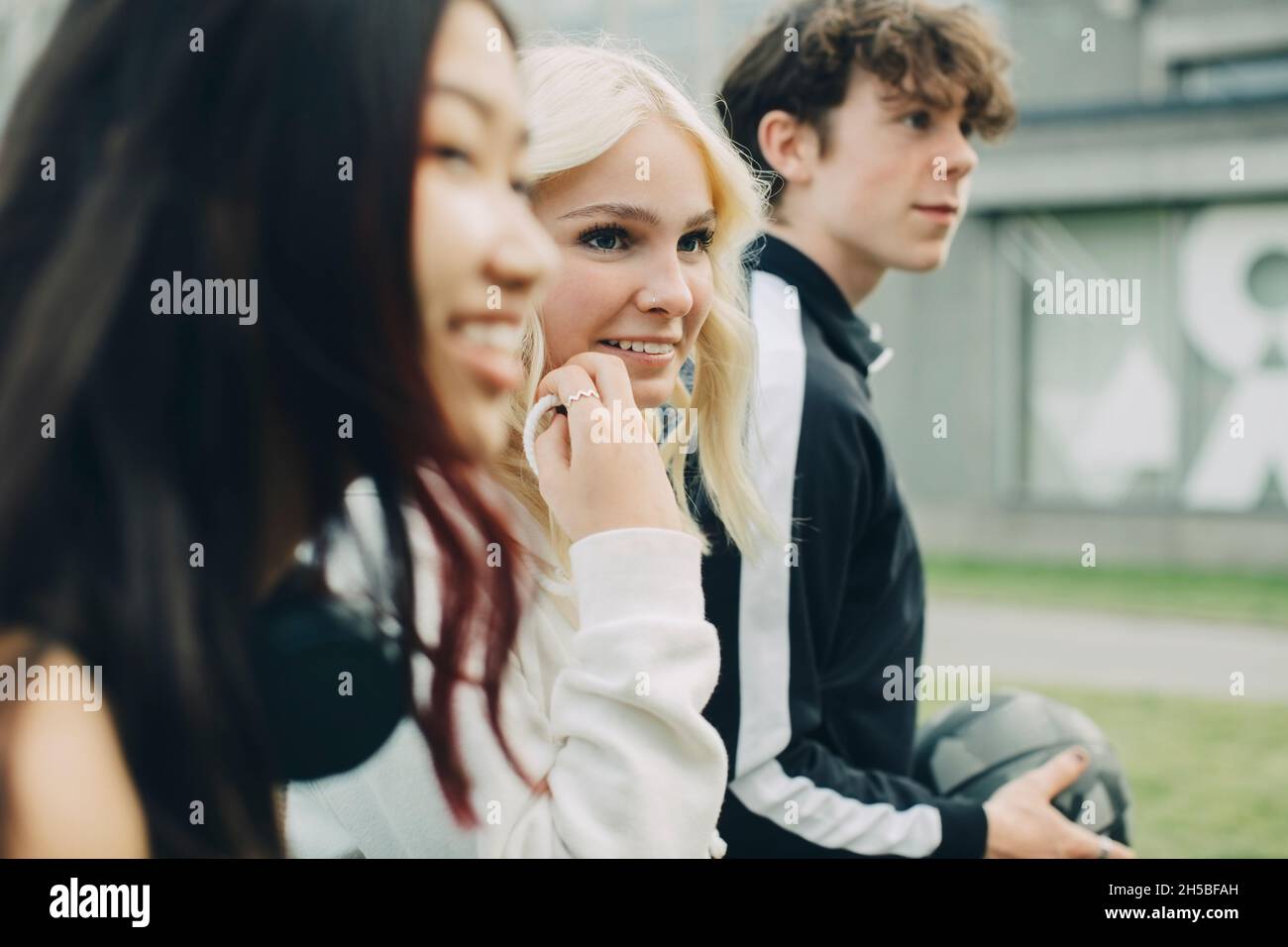 Three young teenage male friends hi-res stock photography and images - Alamy