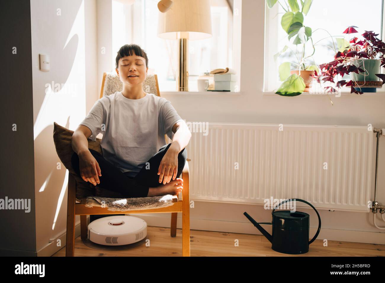 Meditating woman front face hi-res stock photography and images - Alamy