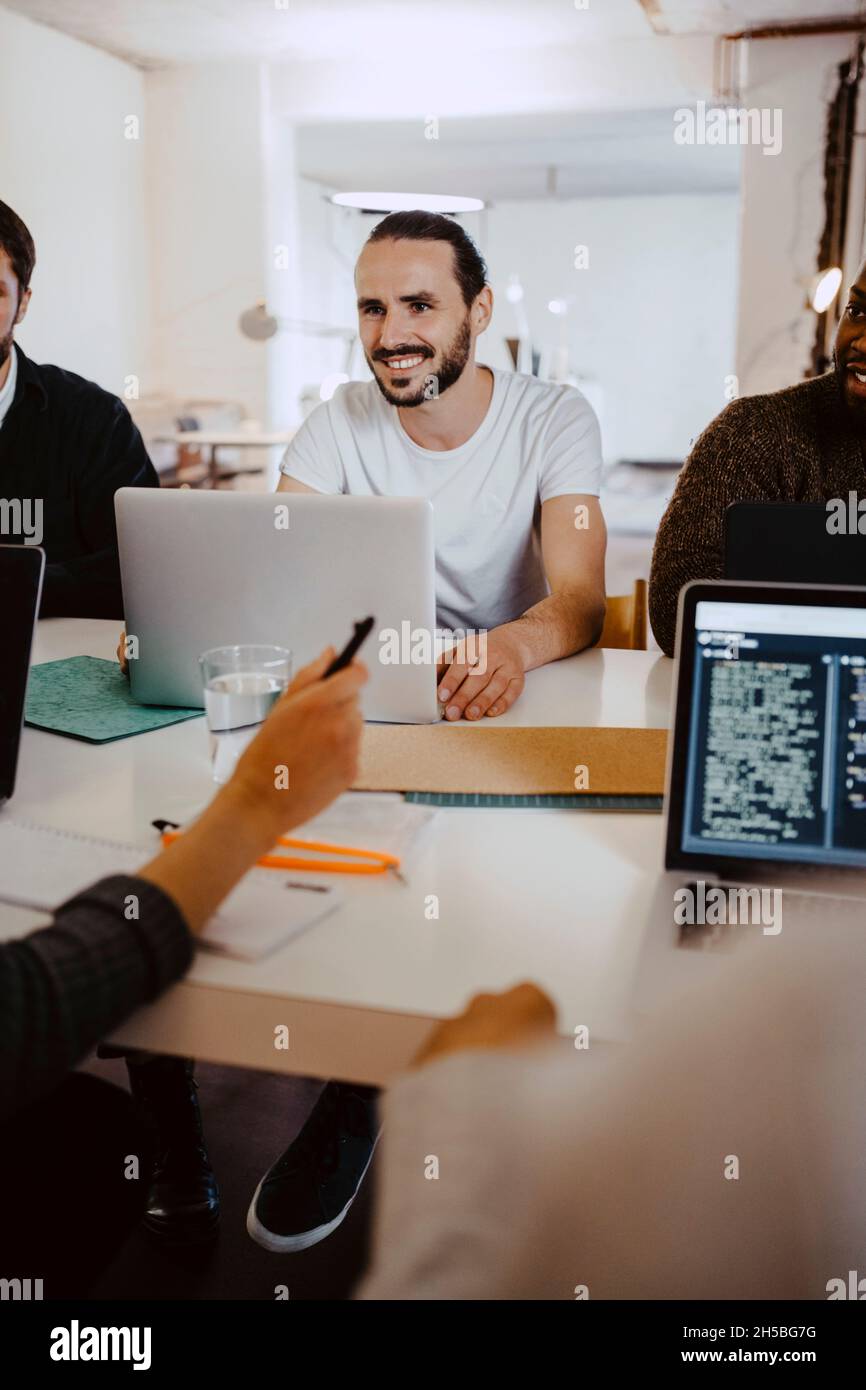 Businesswoman presenting colleagues meeting hi-res stock photography ...