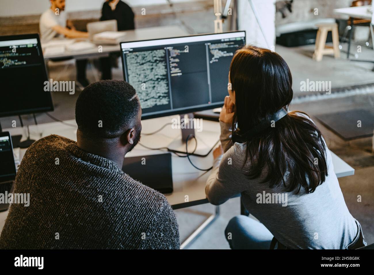 Programmers coding hi-res stock photography and images - Alamy