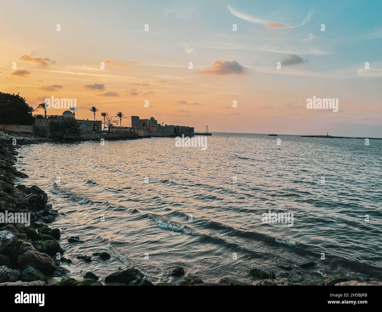 Sidon sea at sunset. The city of Sidon in Lebanon. Sidon Sea Castle ...