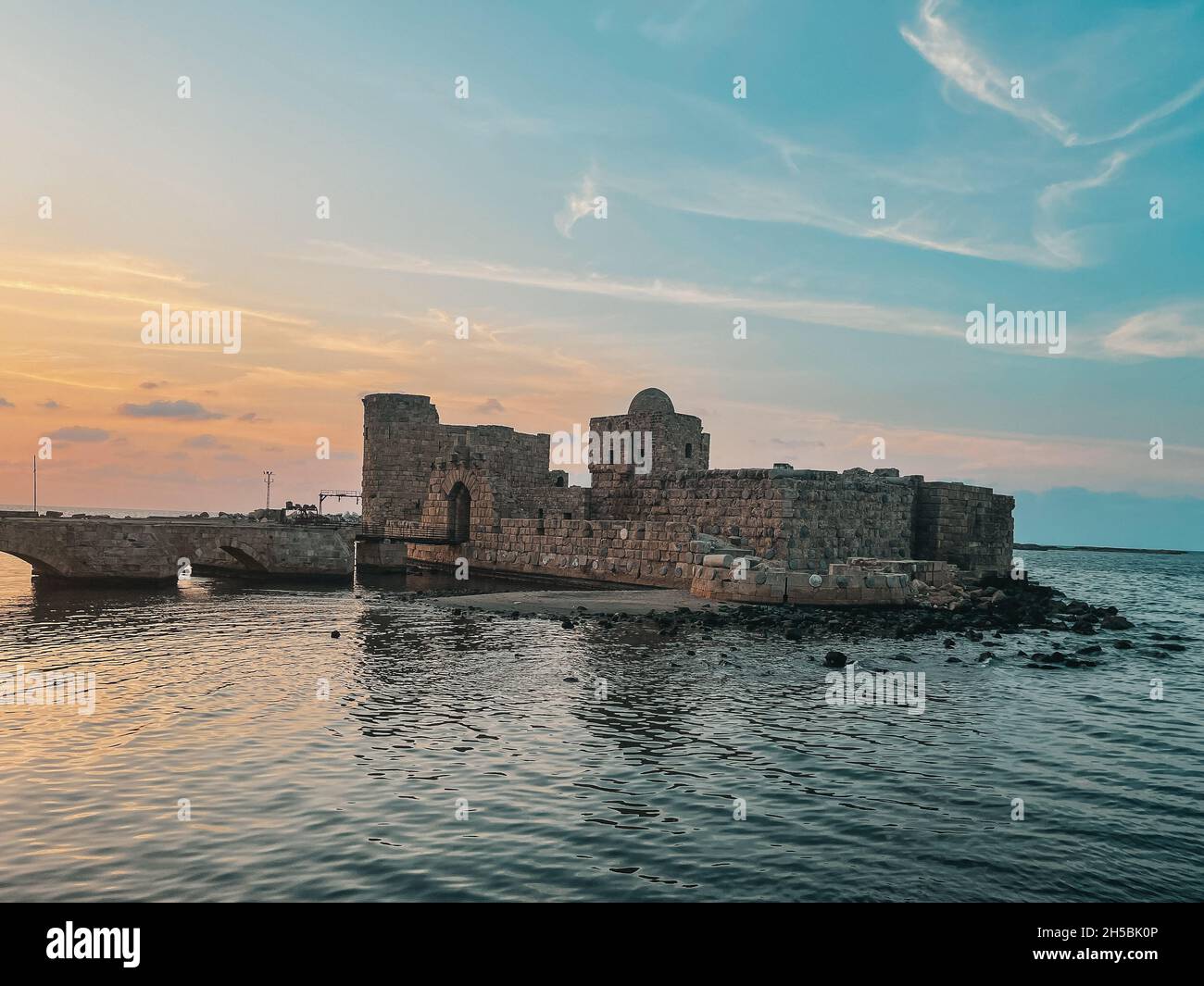 Sidon sea at sunset. The city of Sidon in Lebanon. Sidon Sea Castle ...