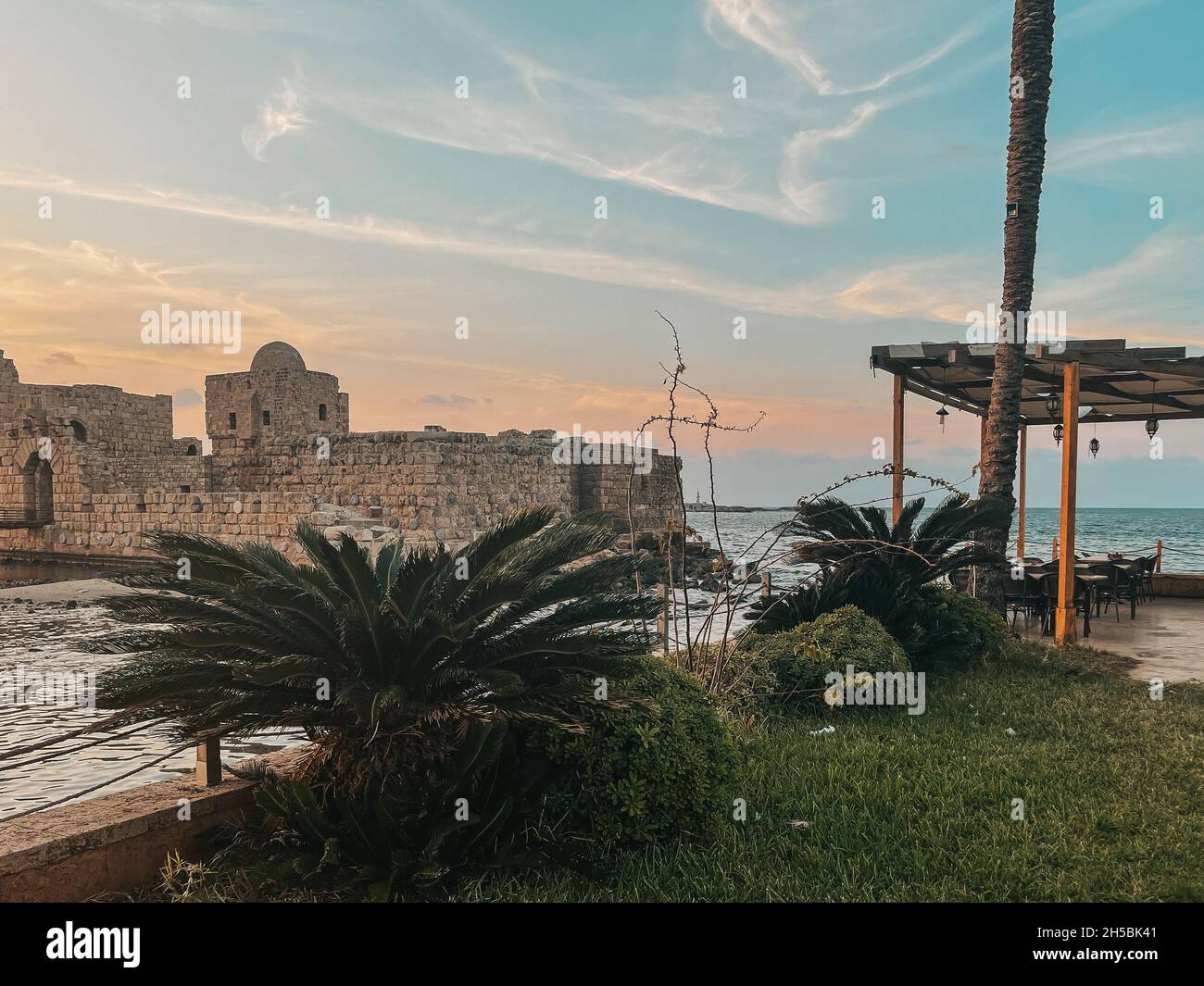Sidon sea at sunset. The city of Sidon in Lebanon. Sidon Sea Castle ...
