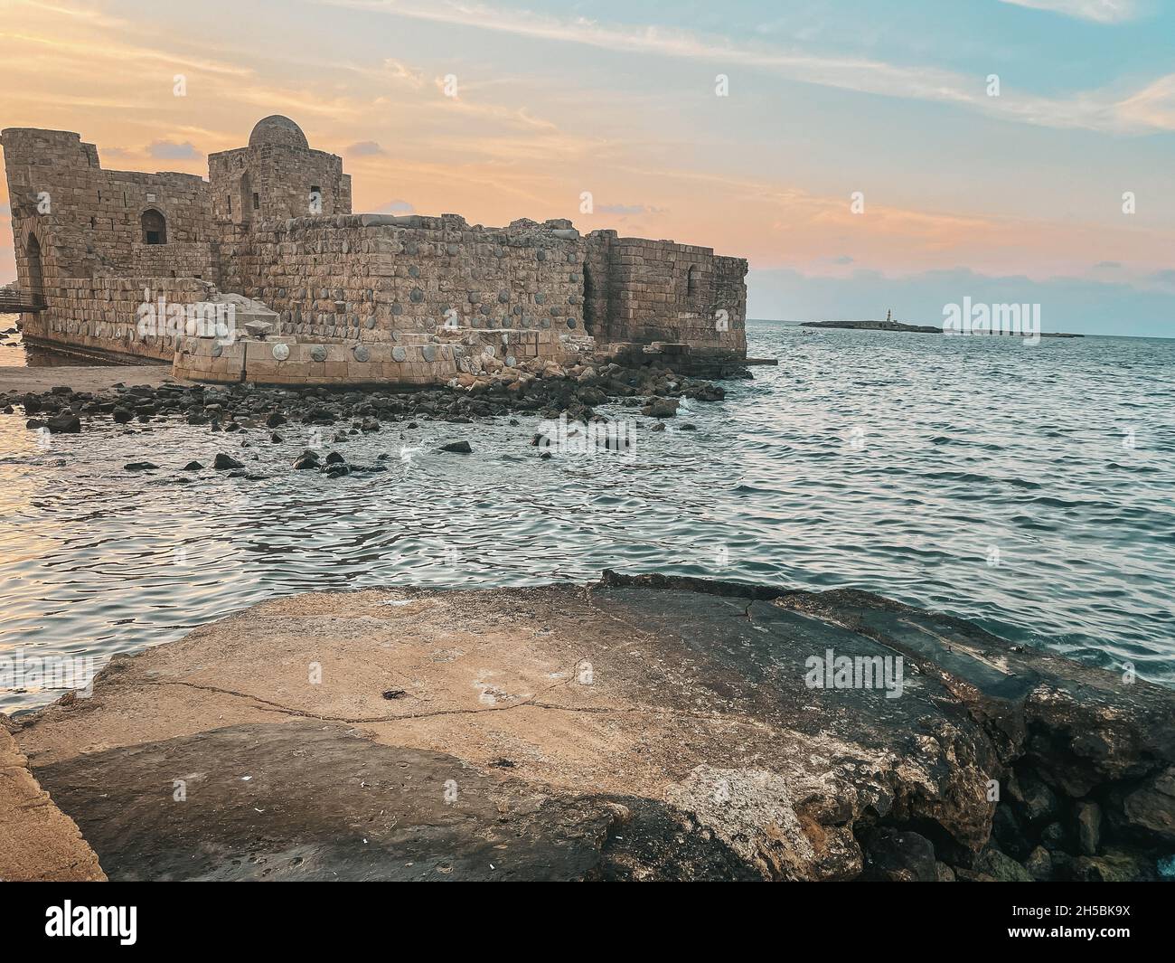 Sidon sea at sunset. The city of Sidon in Lebanon. Sidon Sea Castle ...